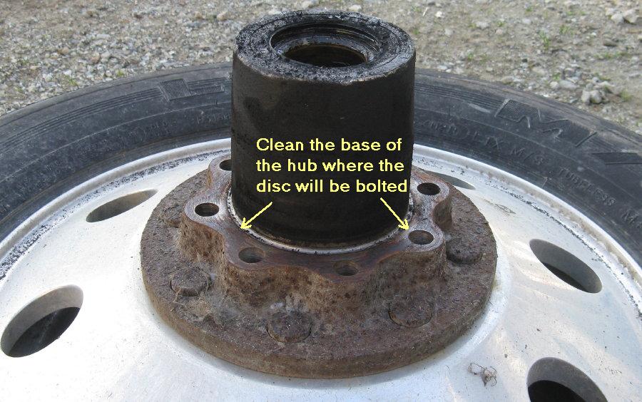 Lift the drum up off the hub. Clean the rust and dirt off the hubs ...