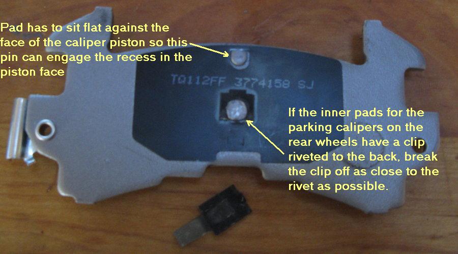 The parking brake calipers are provided with a circular clip that holds ...