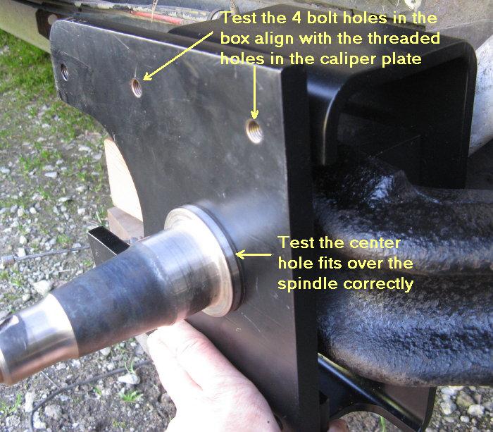 Clean the spindle and apply grease to the bearing surfaces at the base.