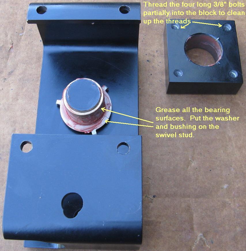 Thread the four long 3/8" bolts into the block to clean up the threads ...